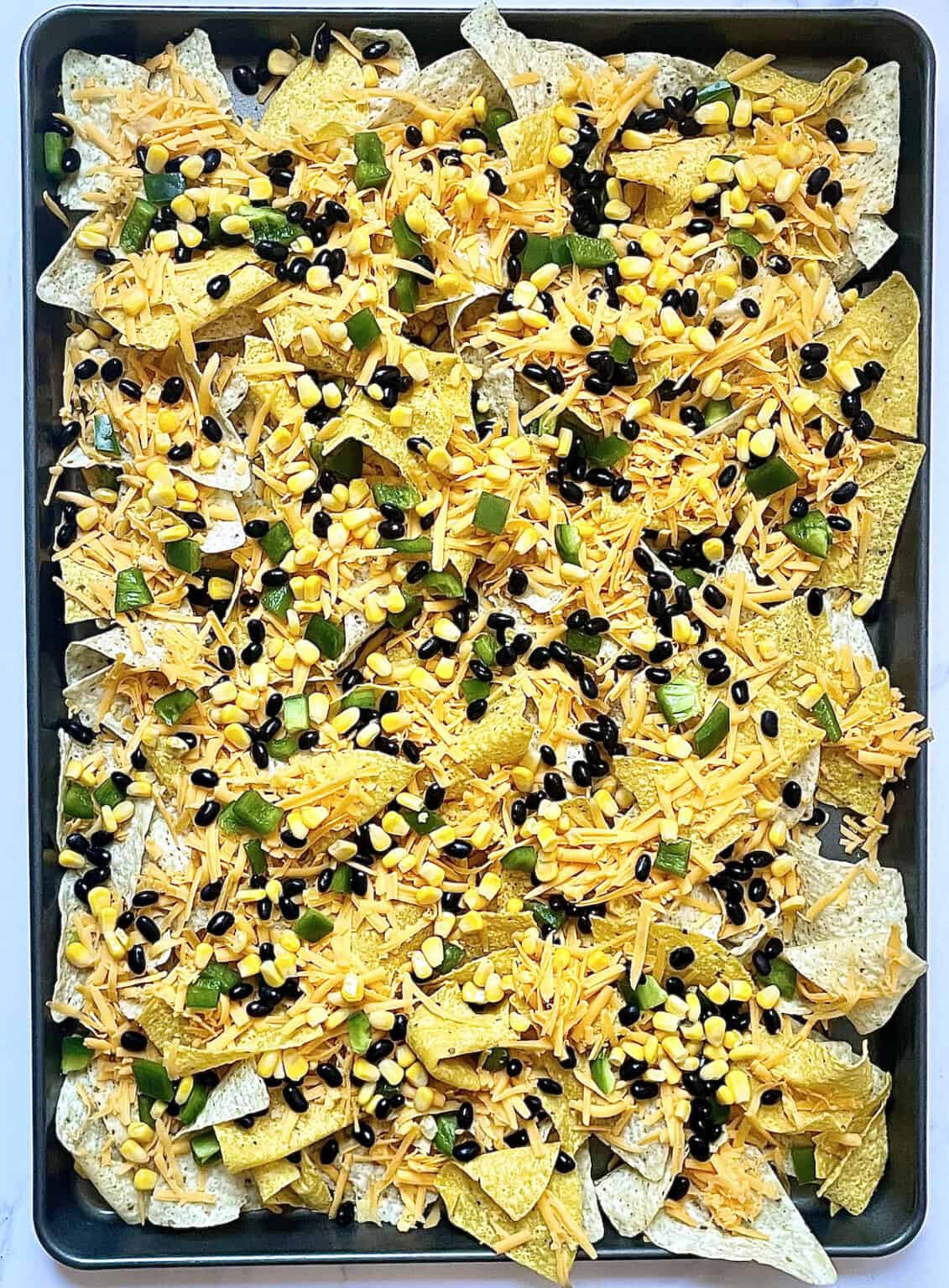 Loaded Sheet Pan Nachos - Tasty Oven